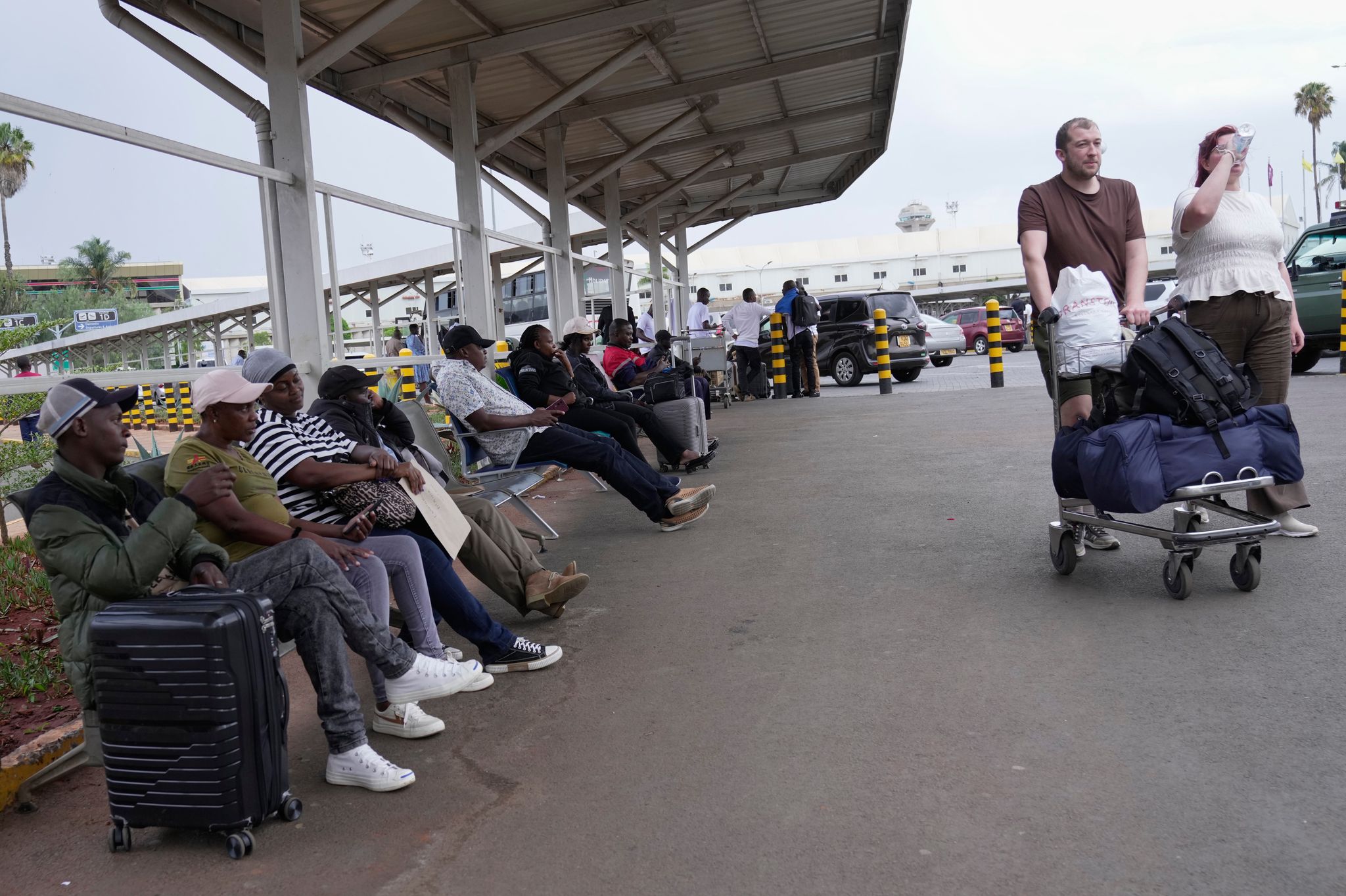 A strike by workers at Kenya's main airport delays flights and strands ...