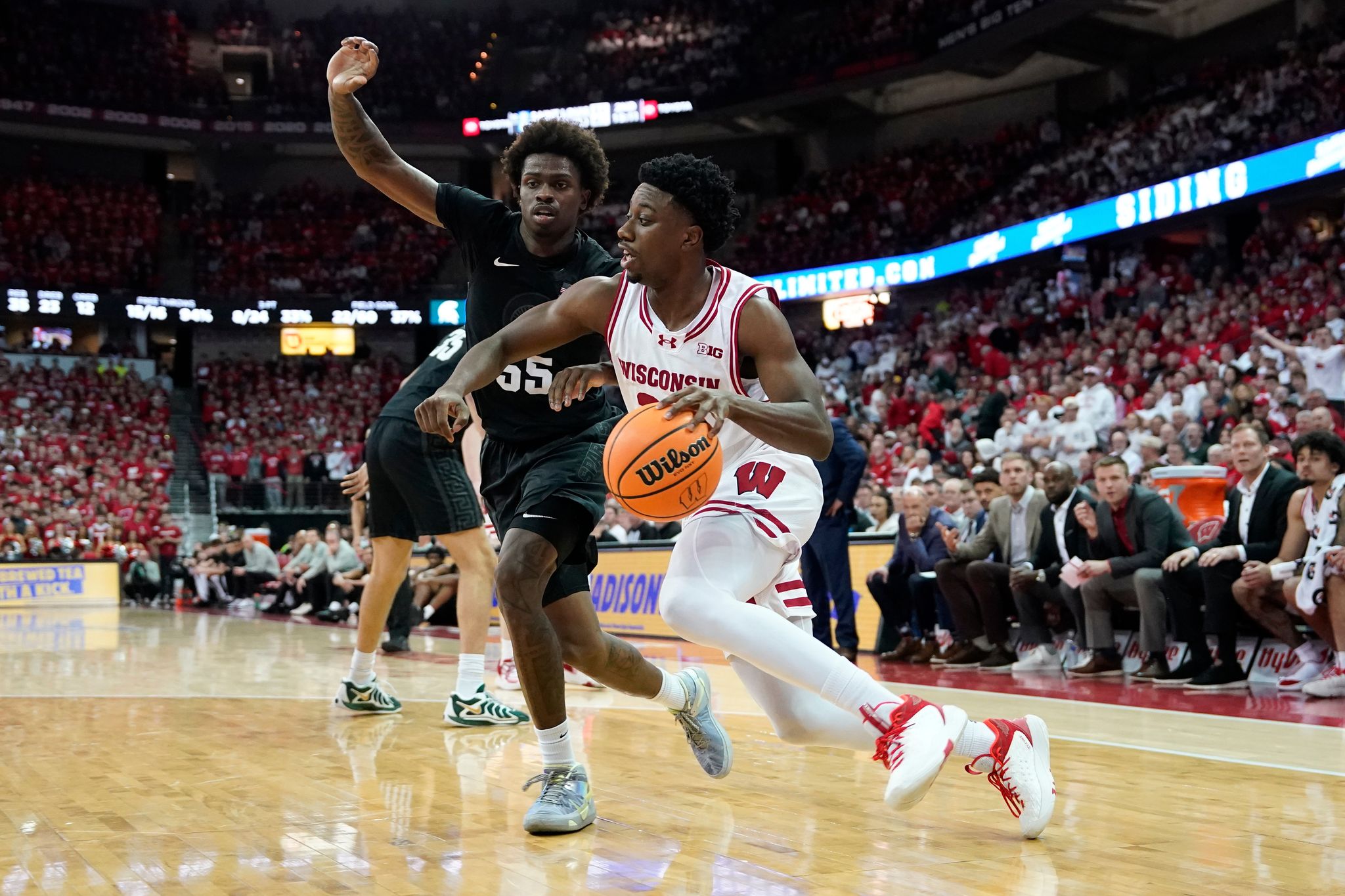 No. 24 Wisconsin moves back into Top 25 by displaying a knack for ...