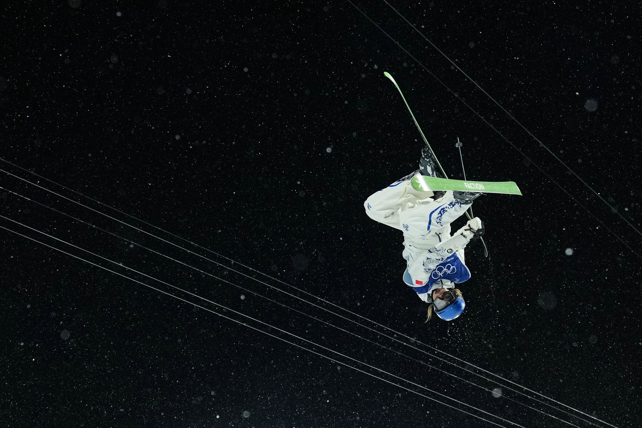 Defending Olympic champion Eileen Gu falls in her first run of freeski ...