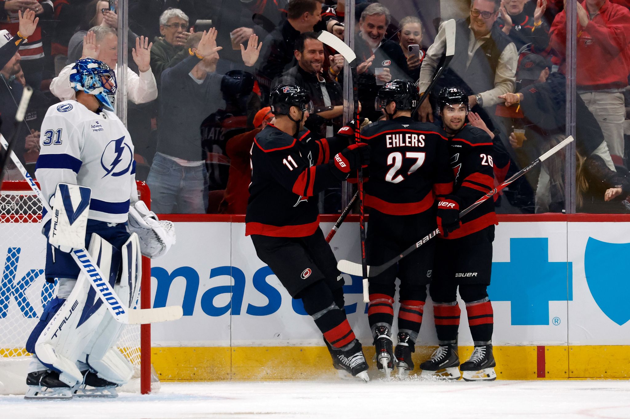Aho's power-play goal helps Hurricanes beat Lightning 5-4 in meeting of ...
