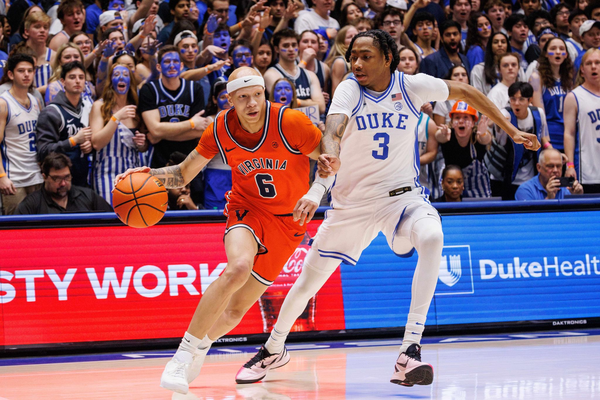 Evans, Boozer help No. 1 Duke beat No. 11 Virginia 77-51 to clinch ACC ...