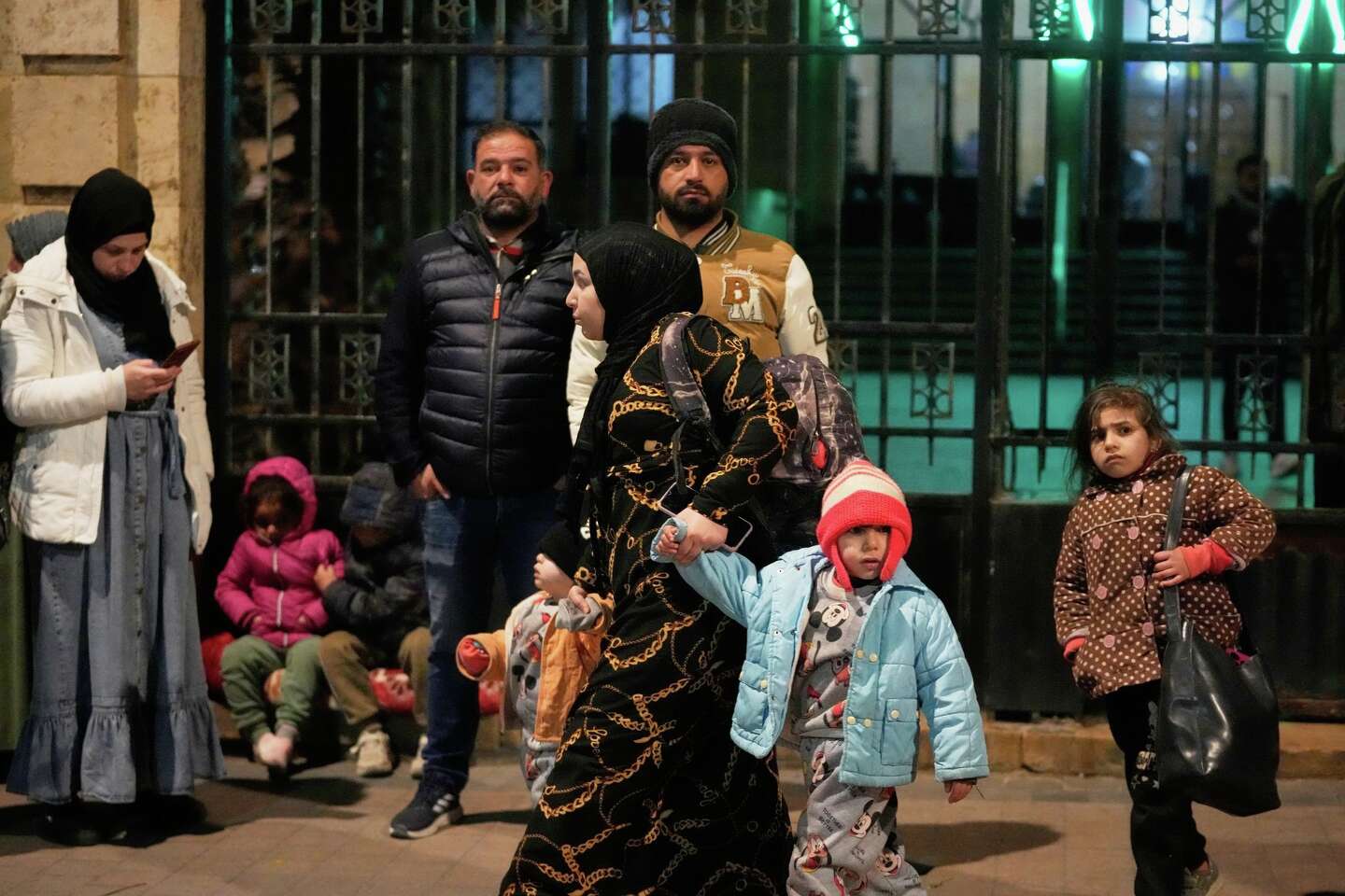 Photos show people fleeing and buildings wrecked after Israeli strikes ...