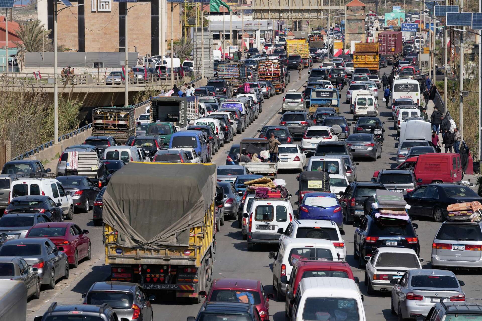 Photos show people fleeing and buildings wrecked after Israeli strikes ...