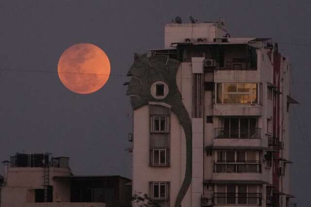 Photos of a blood-red moon and total lunar eclipse