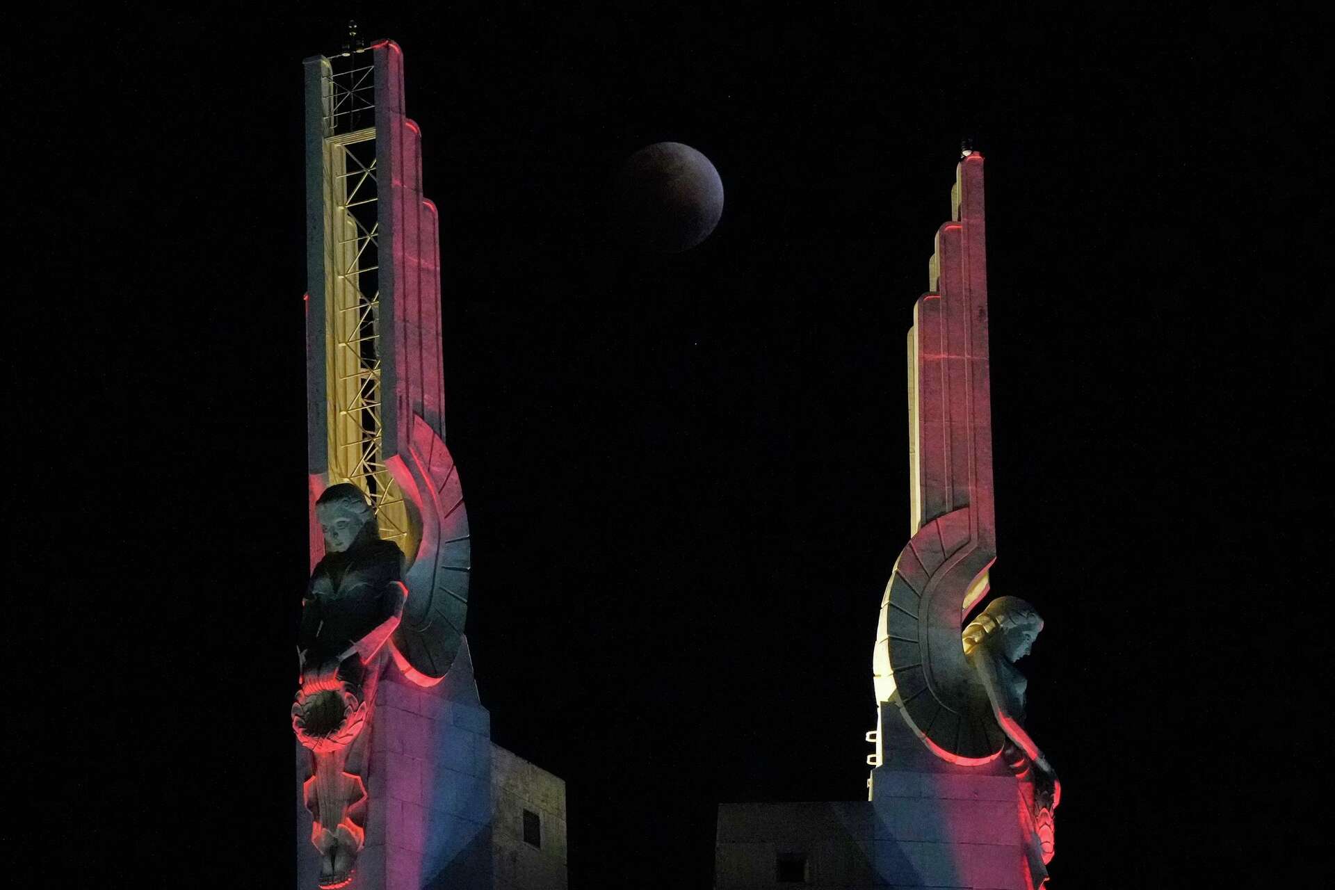Photos of a blood-red moon and total lunar eclipse