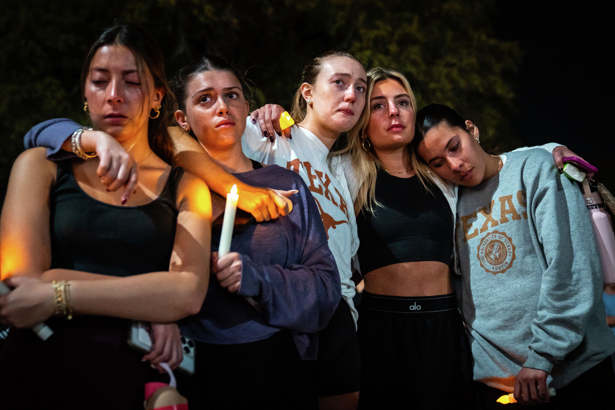 UT students, community gather to hold vigil for victims of shooting