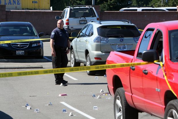 Police kill alleged getaway driver at bank robbery