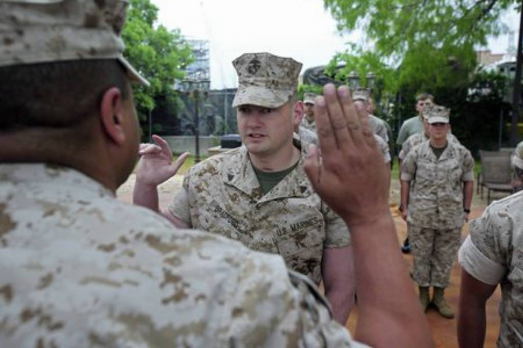 Marine is first blind double amputee to re-enlist