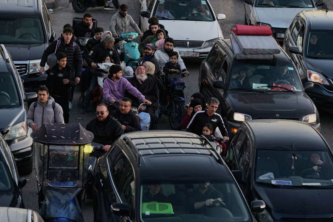 Photos show people fleeing and buildings wrecked after Israeli strikes ...