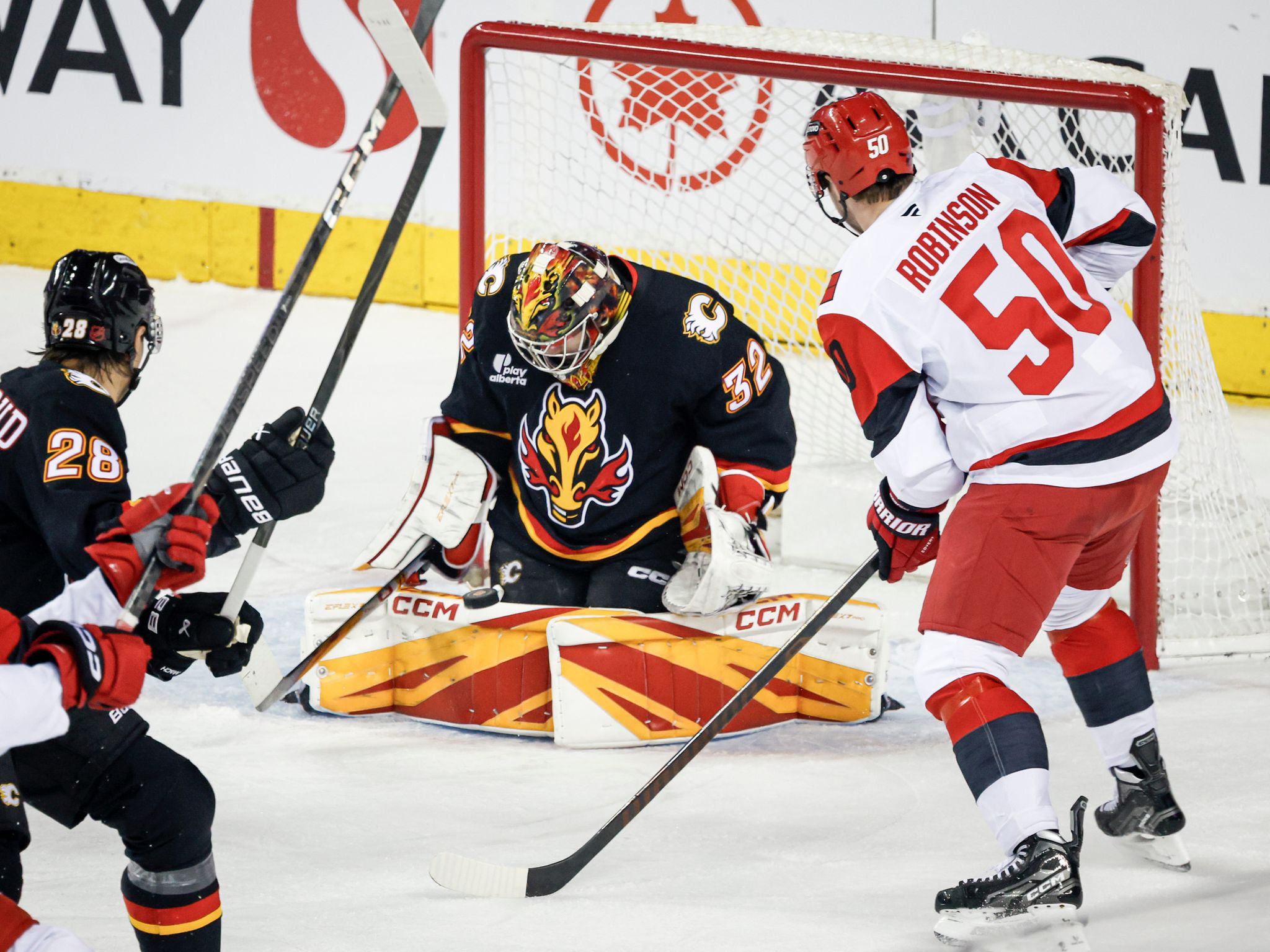 Joel Farabee scores 2 goals as Flames edge Hurricanes 5-4