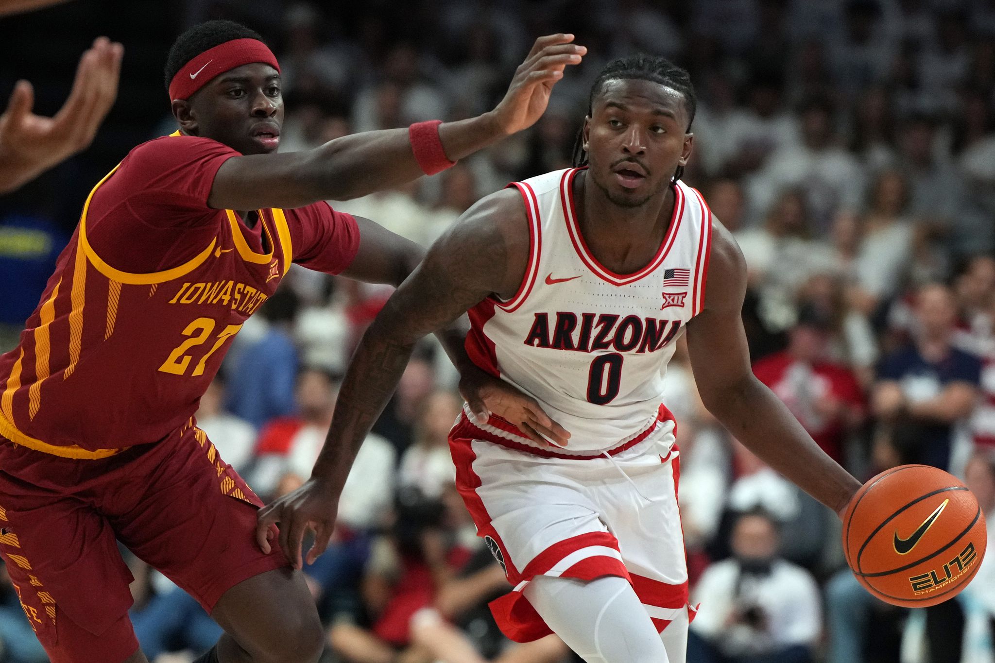 Arizona guard Jaden Bradley and coach Tommy Lloyd pick up Big 12 awards