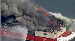 Massive fire breaks out aboard scrap metal barge on Delaware Bay