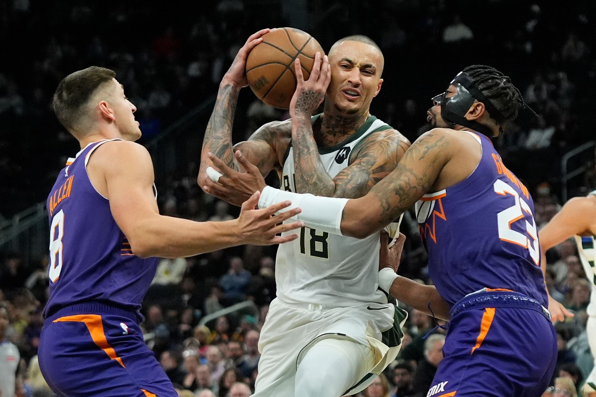 Hot-shooting Suns have three 20-point scorers in 129-114 victory over Bucks