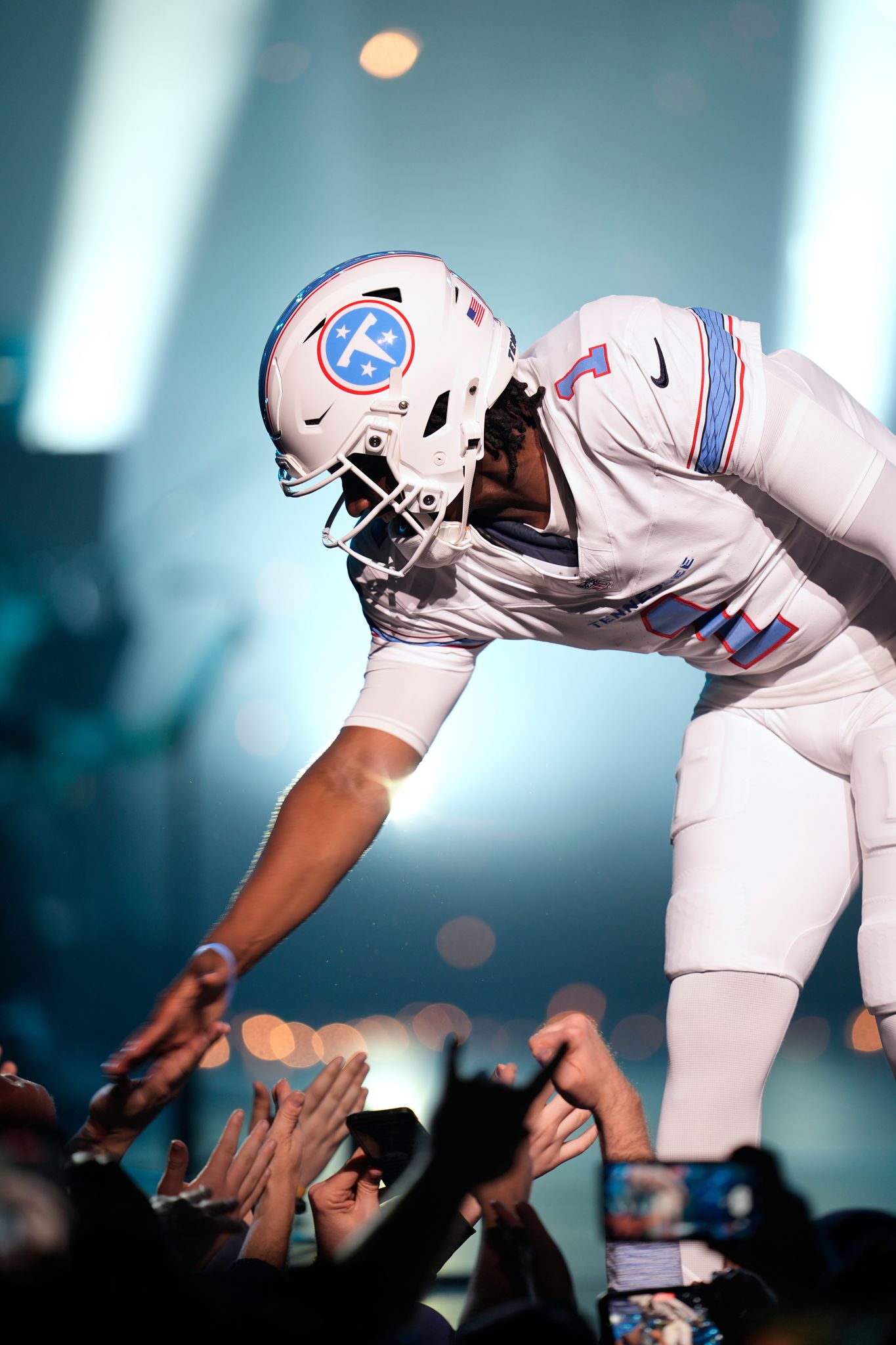 Titans unveil new uniforms and logos to go with new coach and new ...
