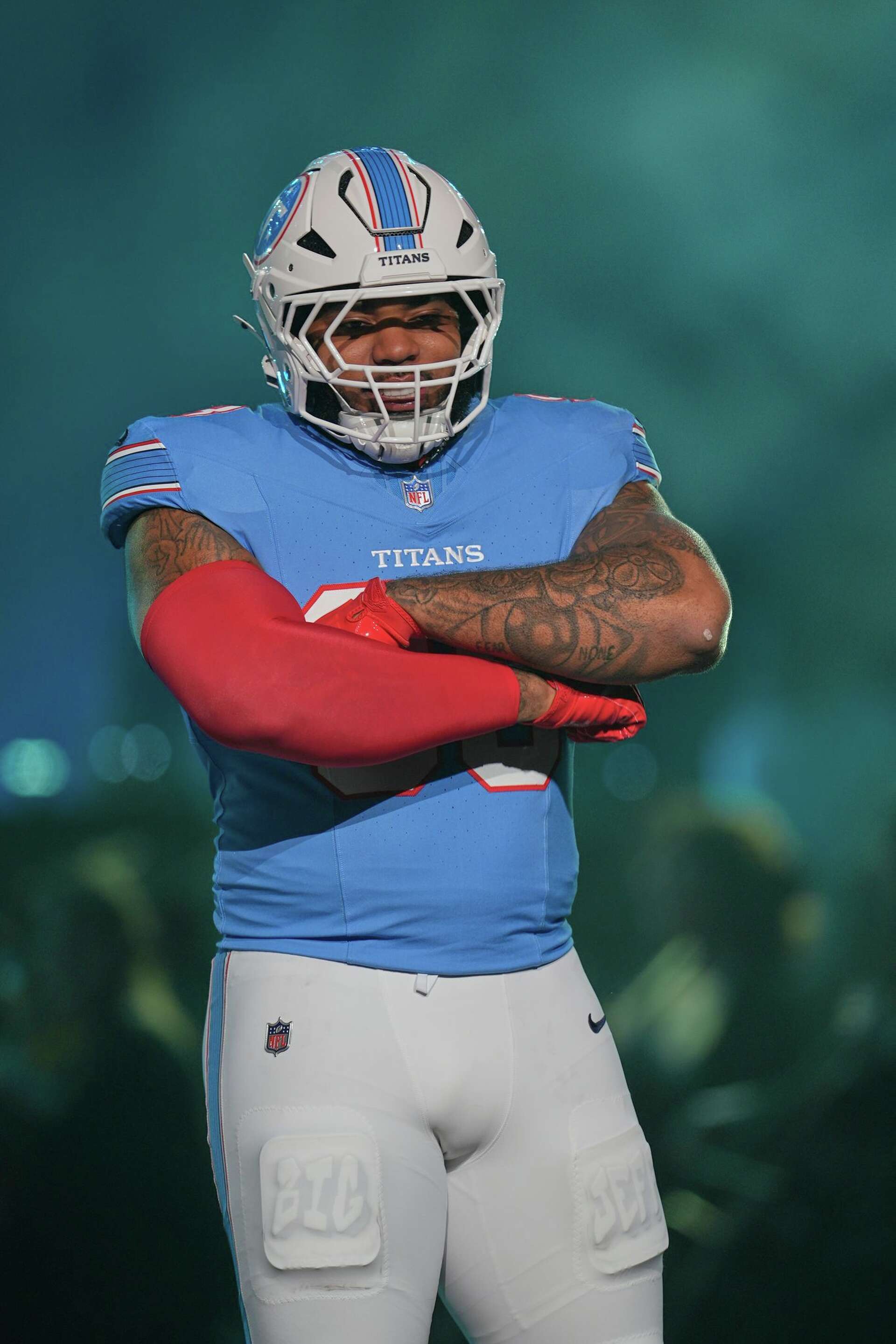 Titans unveil new uniforms and logos to go with new coach and new ...