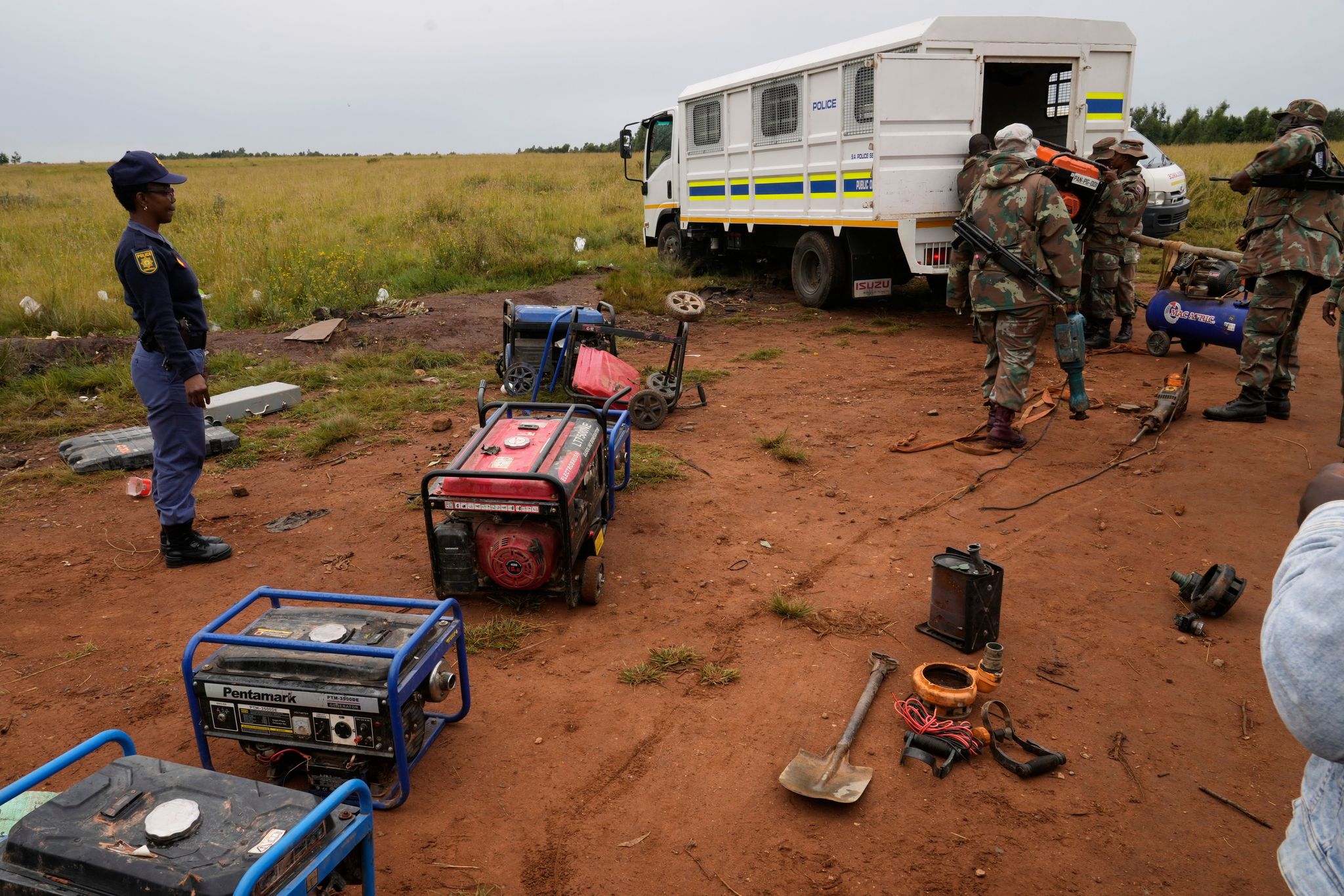 South African soldiers dismantle illegal mining operations near ...