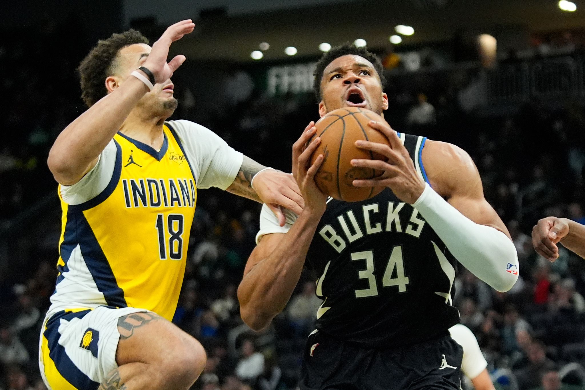 Giannis Antetokounmpo leaves Bucks' victory over Pacers after landing ...