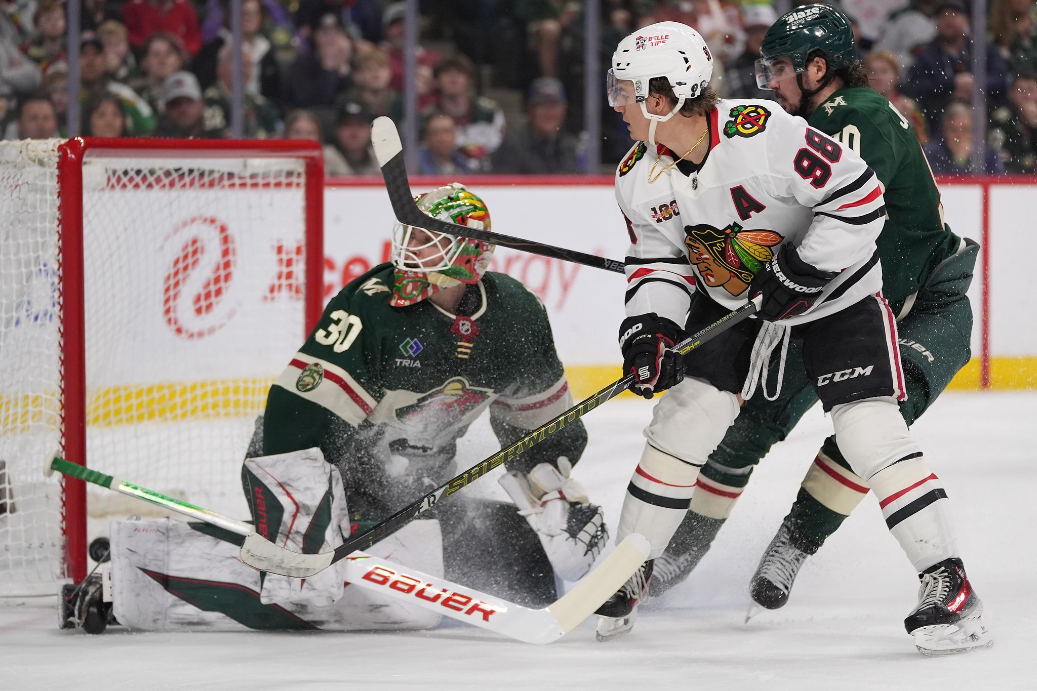 Bedard scores, Blackhawks hang for first win over Wild in seven years