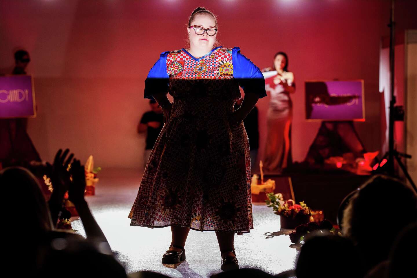 Models with Down syndrome walk a Bucharest runway for World Down ...