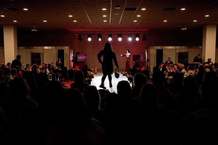 Models with Down syndrome walk a Bucharest runway for World Down ...
