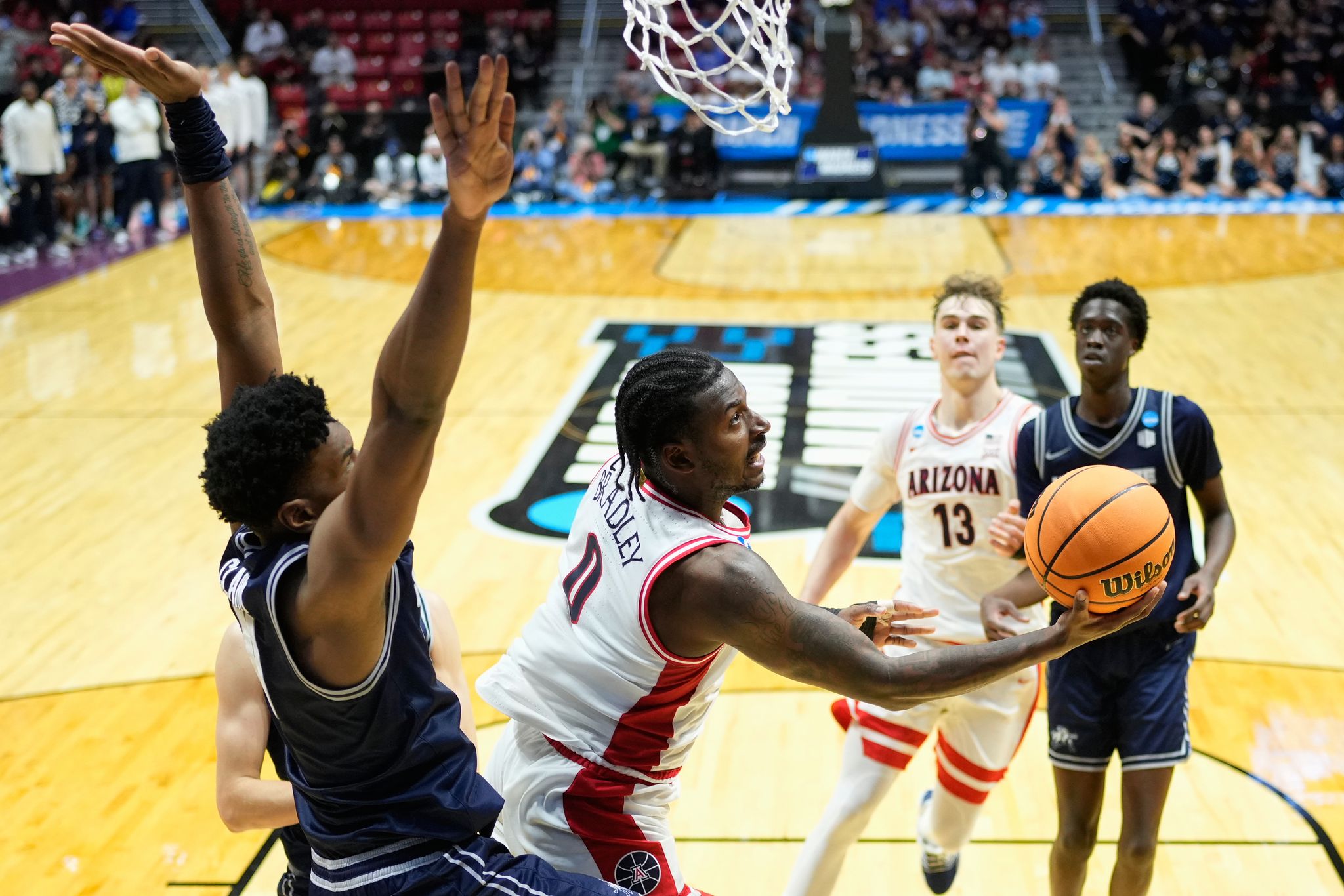 Bradley scores 18 points to lead No. 1-seeded Arizona past Utah State ...