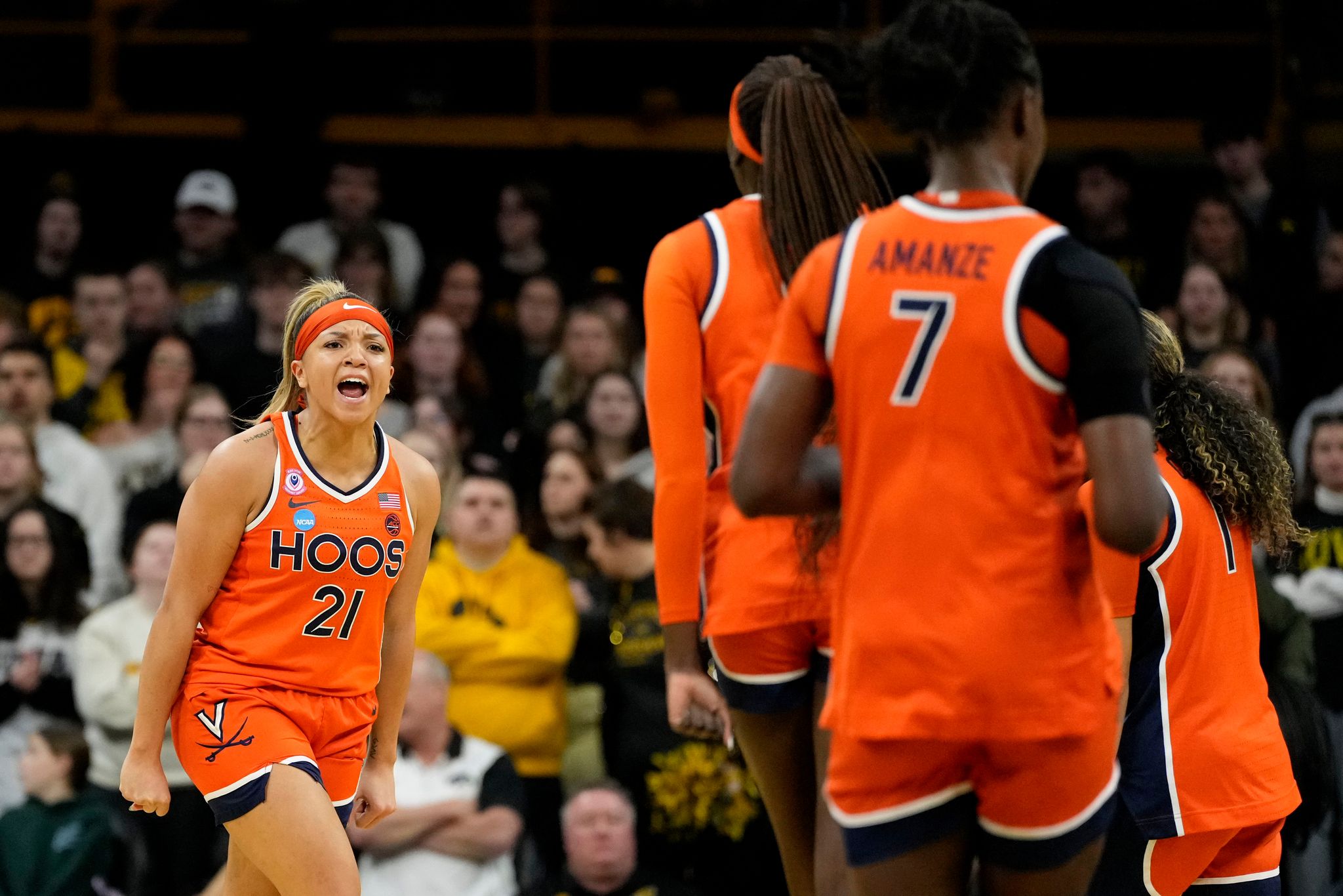 No. 10 seed Virginia beats second-seeded Iowa 83-75 in double-overtime ...