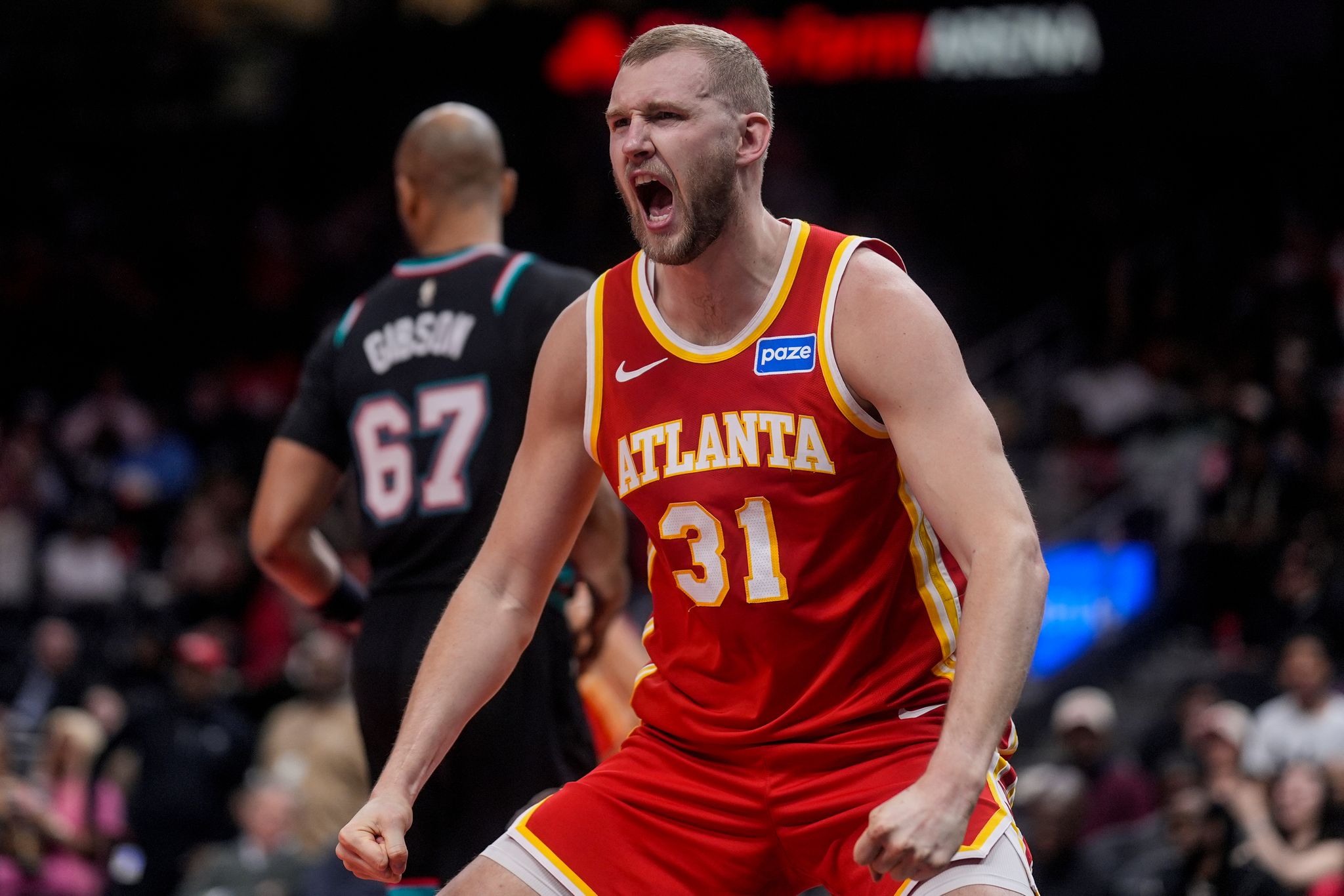 Hawks get double-digit scoring from 8 players and beat Grizzlies 146-107