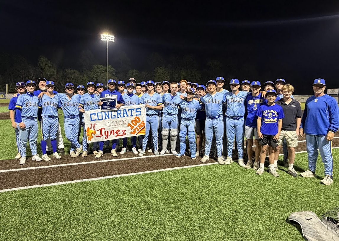 Kelly Catholic baseball coach Jason Tyner celebrates 100th win