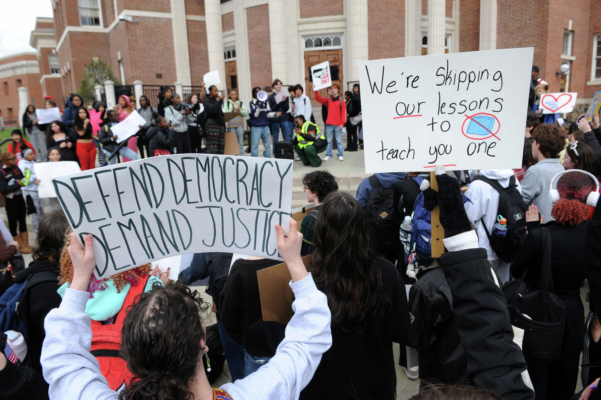 Over 100 Hamden High students stage walkout in protest against ICE