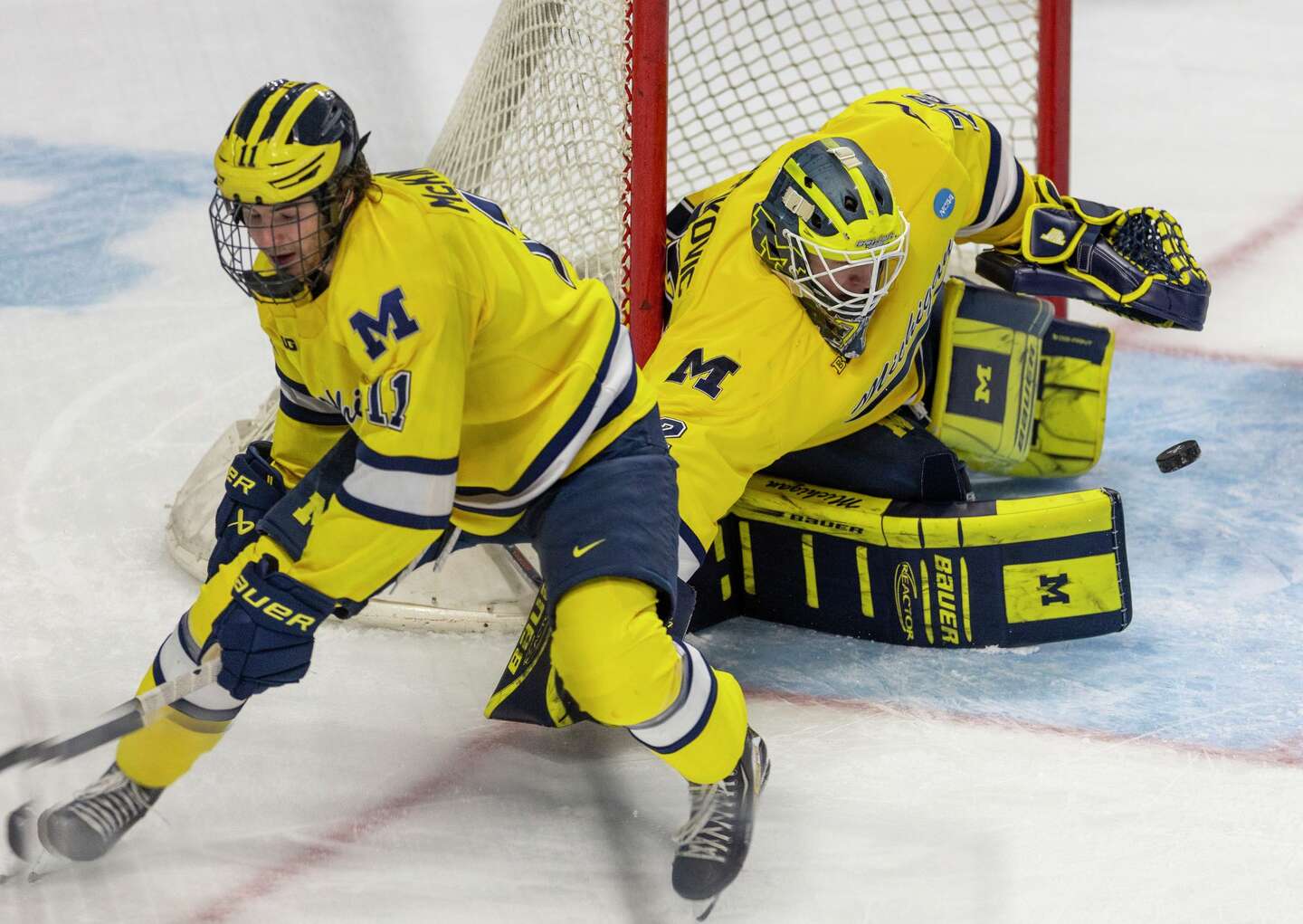 Denver, Wisconsin win Frozen Four games, to play for national title
