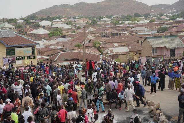 Gunmen kill at least 20 in nighttime attack in Nigeria