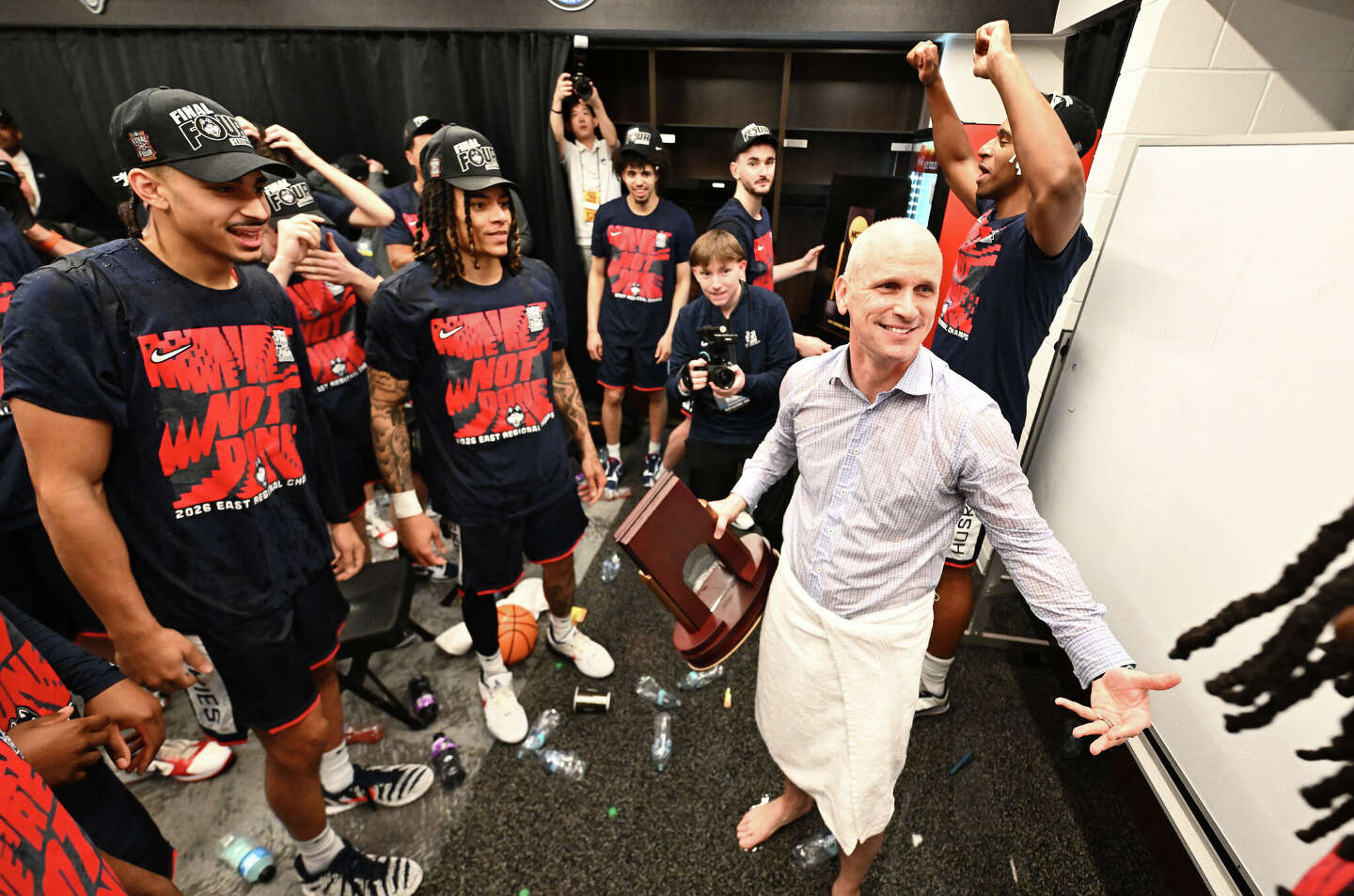 Dan Hurley explains why he wore towel in UConn locker room