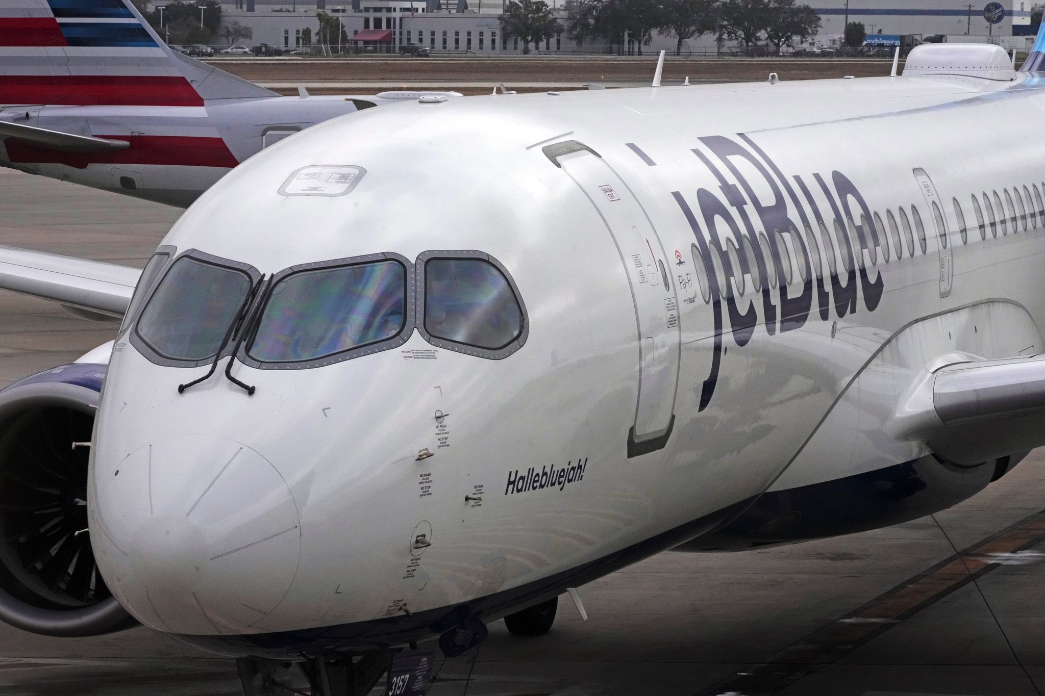 JetBlue raises its checked bag fees by as much as $9 as the Iran war ...