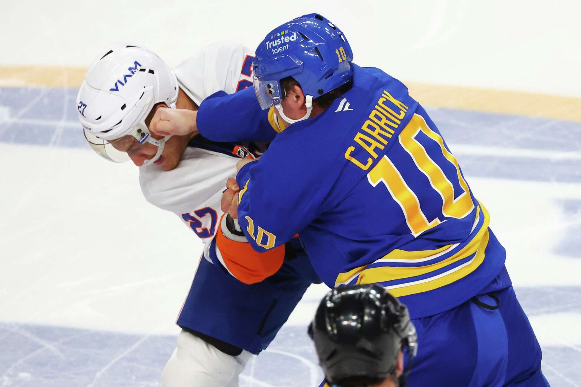 Sabres center Sam Carrick suffers left arm injury in fight with ...