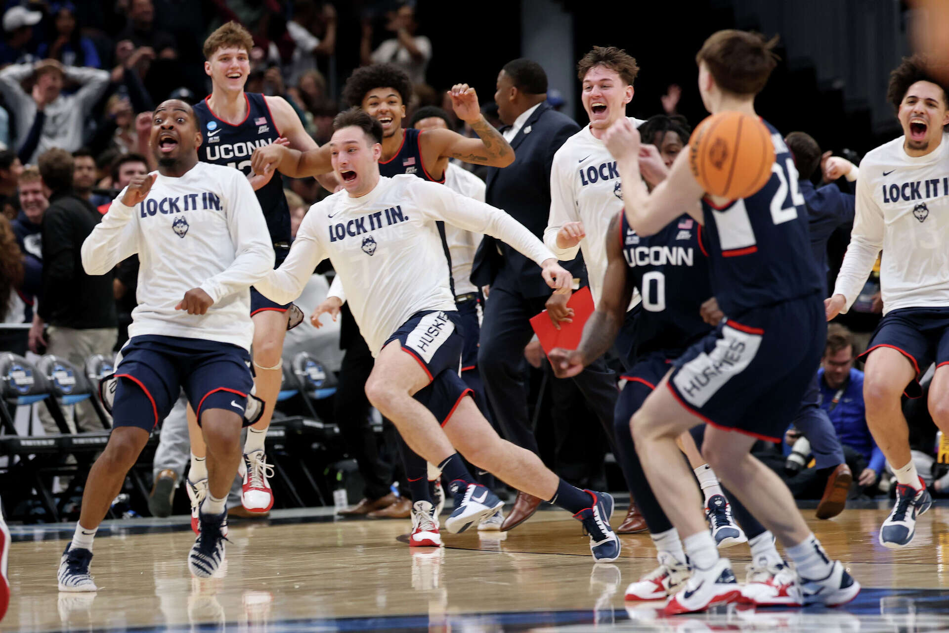 Andrea Hurley held UConn players back from celebrating Mullins' winner