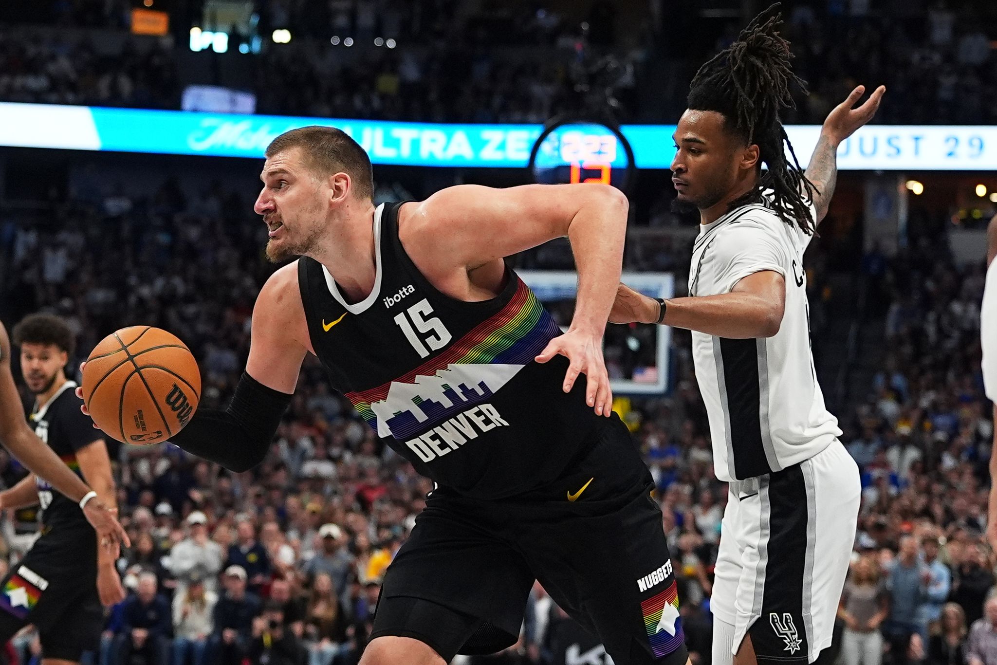 Nuggets end Spurs' win streak with 136-134 win in OT