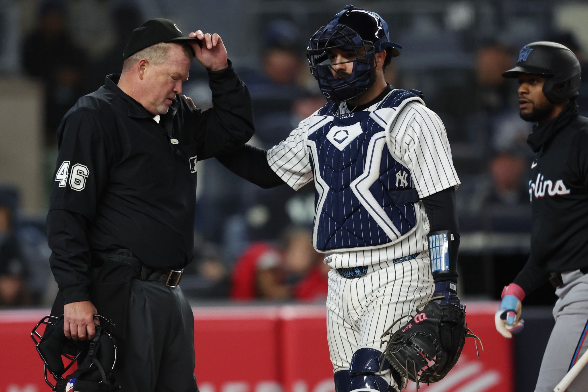 Umpire Ron Kulpa diagnosed with concussion after being hit on mask with ...