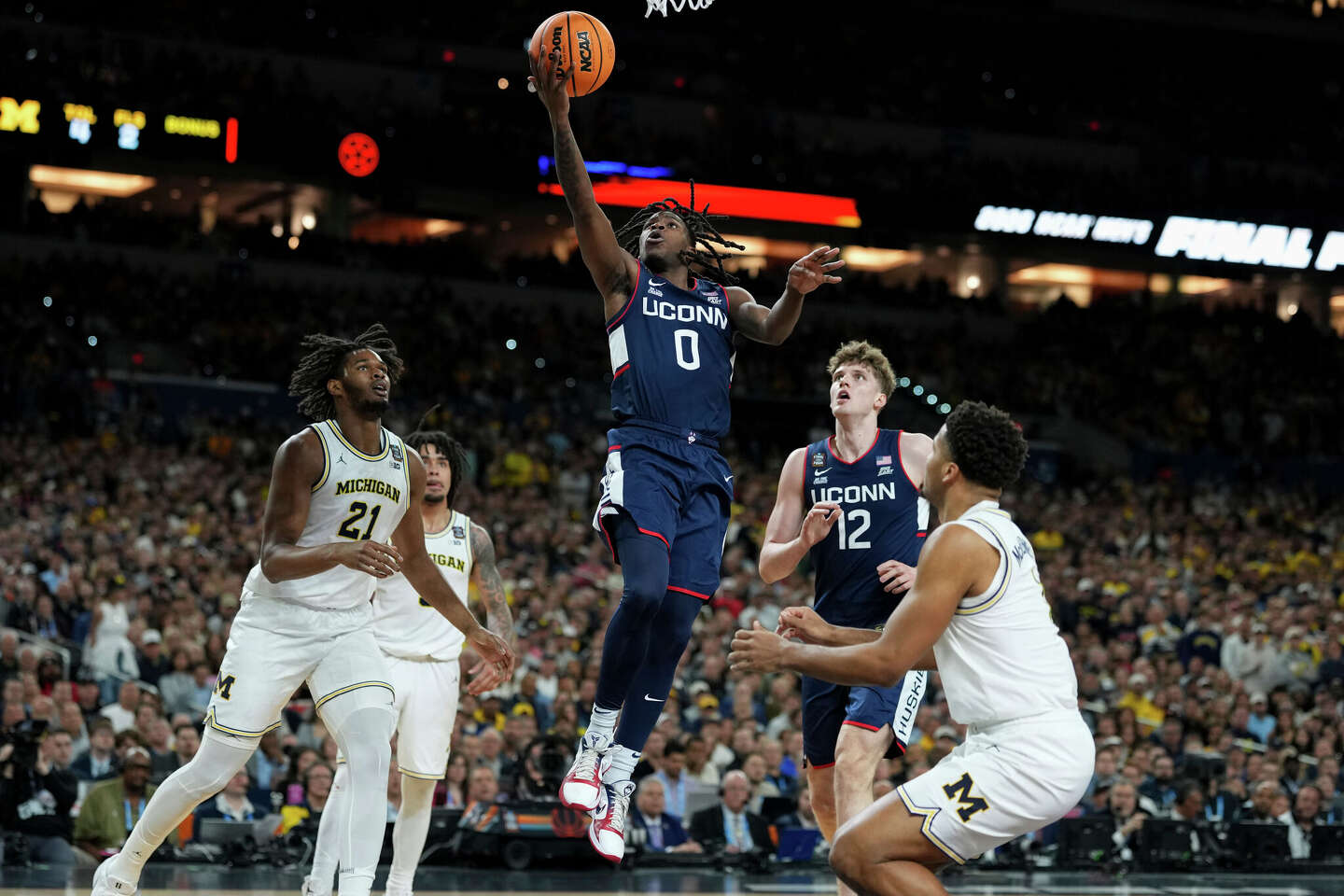 Here's where to watch and stream UConn vs. Michigan: HBO Max, Sling TV