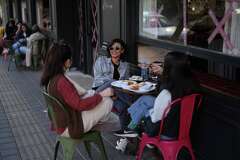 Photos from Tehran, where daily life continues despite war