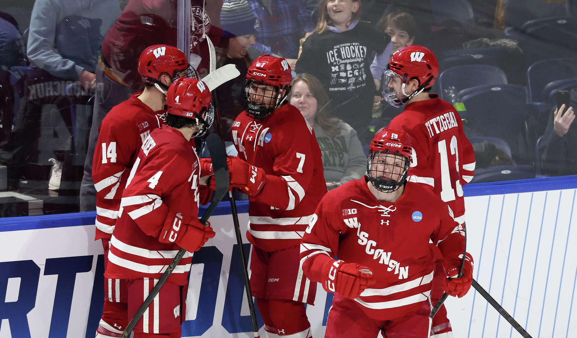 Denver, Wisconsin win Frozen Four games, to play for national title