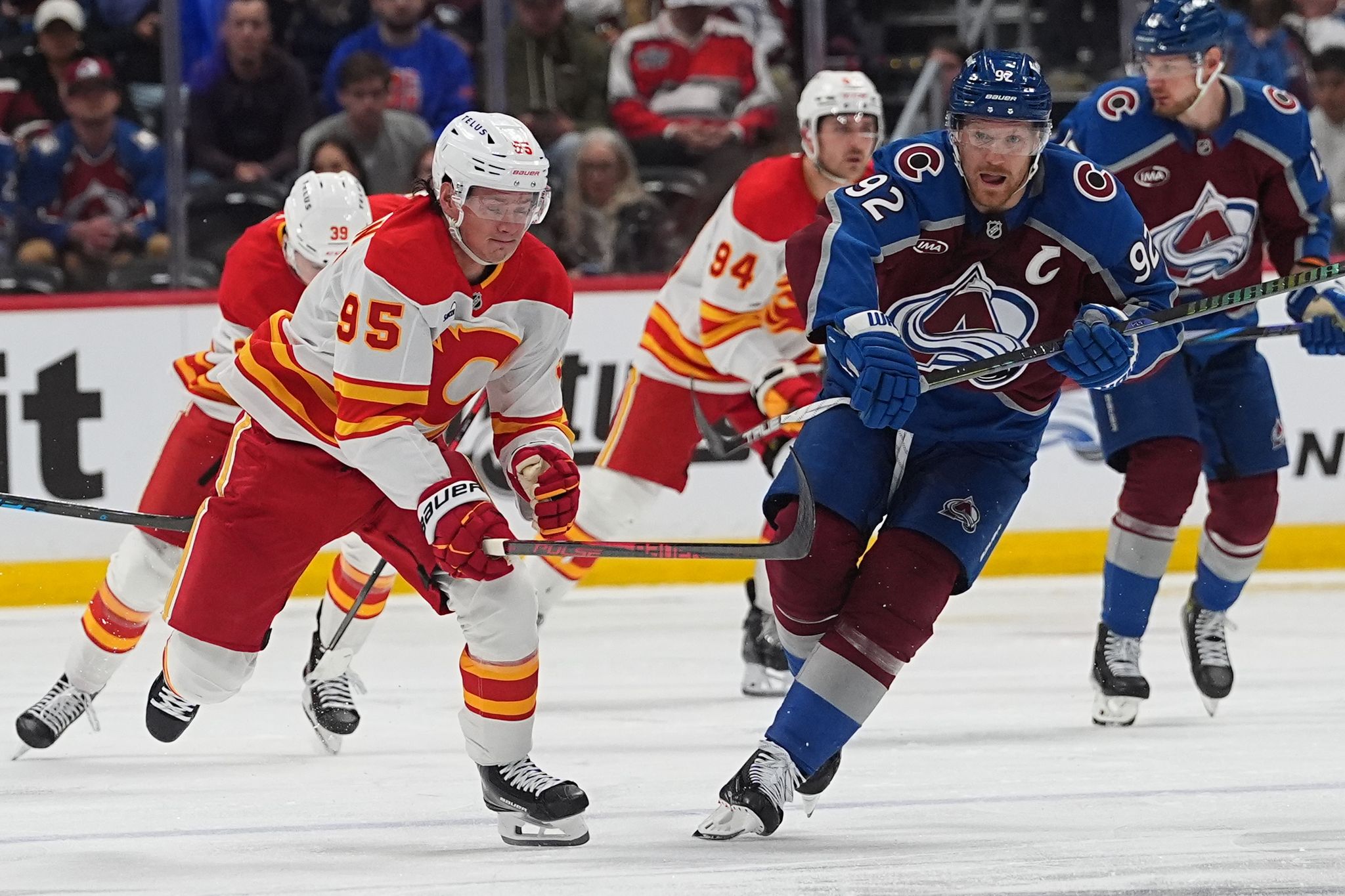 MacKinnon scores career-high 52nd goal of season, Avs clinch NHL's top ...