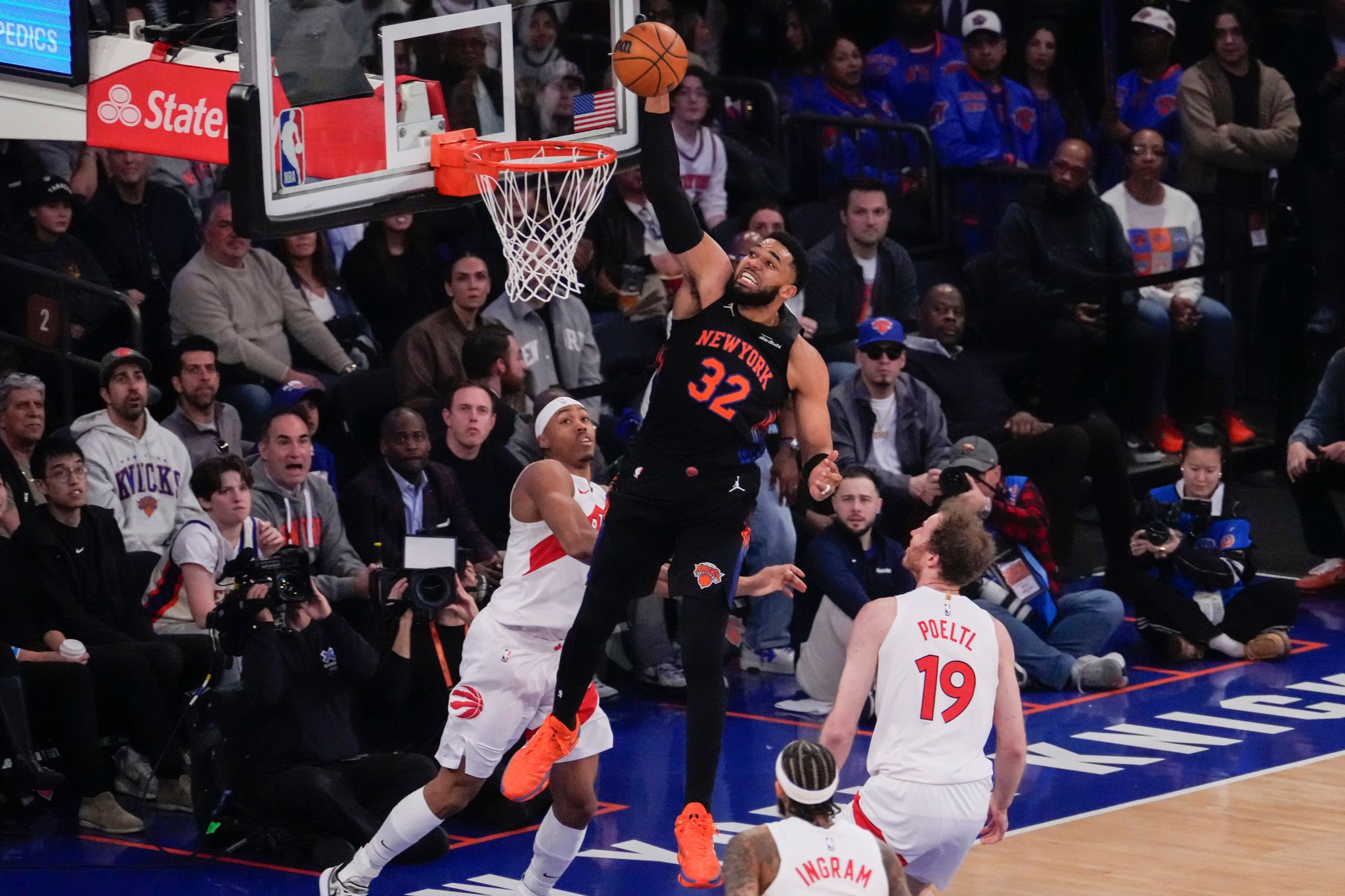 Knicks beat Raptors for 13th straight time and wrap up No. 3 seed in ...