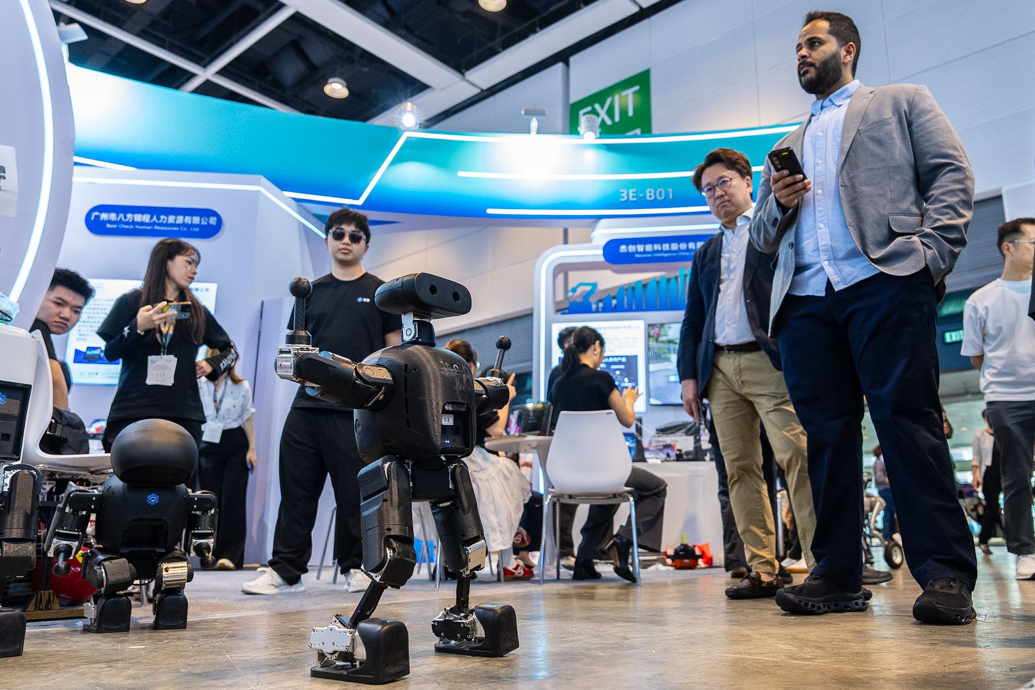 Humanoid robots show off their language and boxing skills in Hong Kong