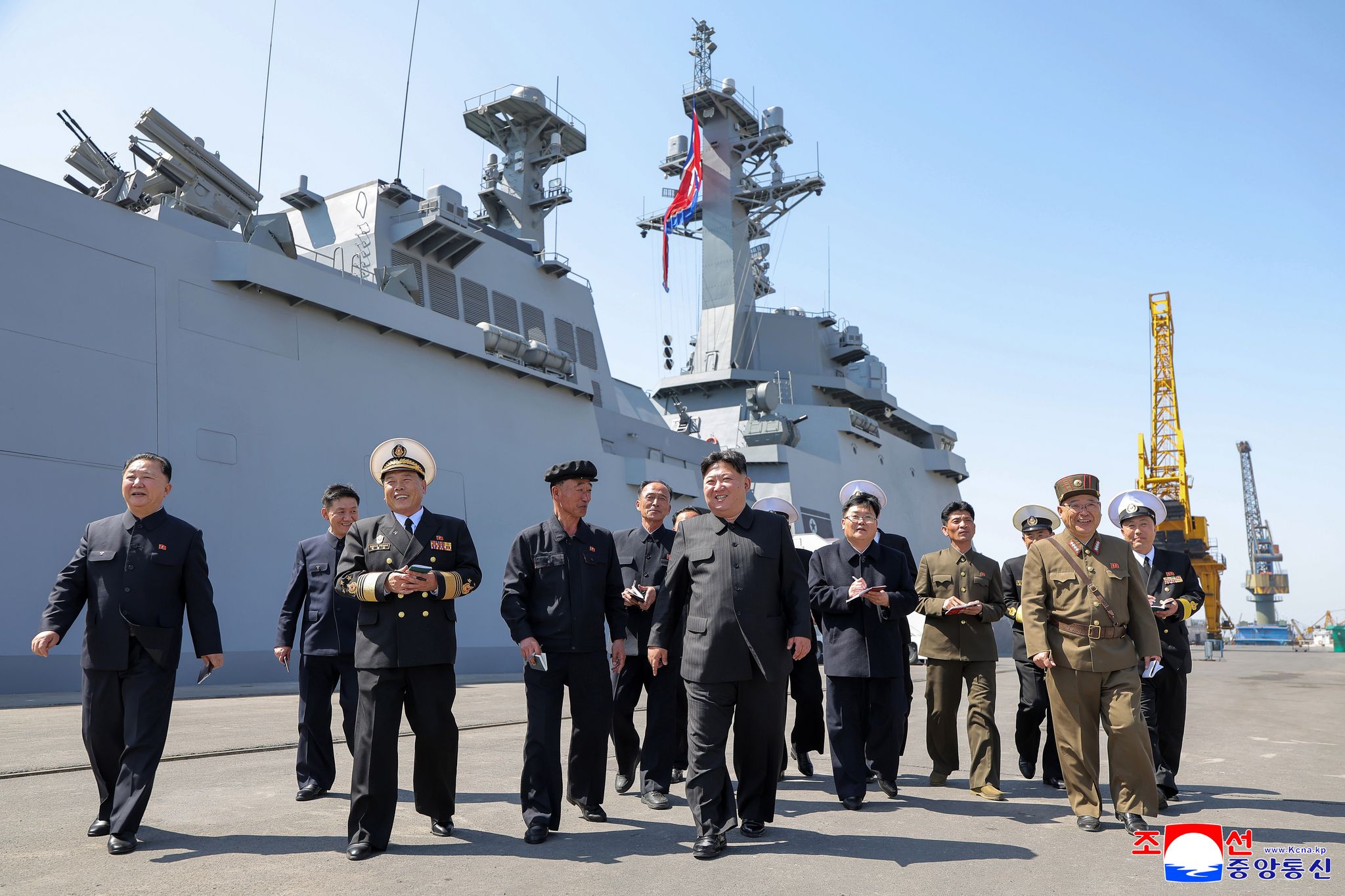 North Korean leader supervises missile tests from his naval destroyer