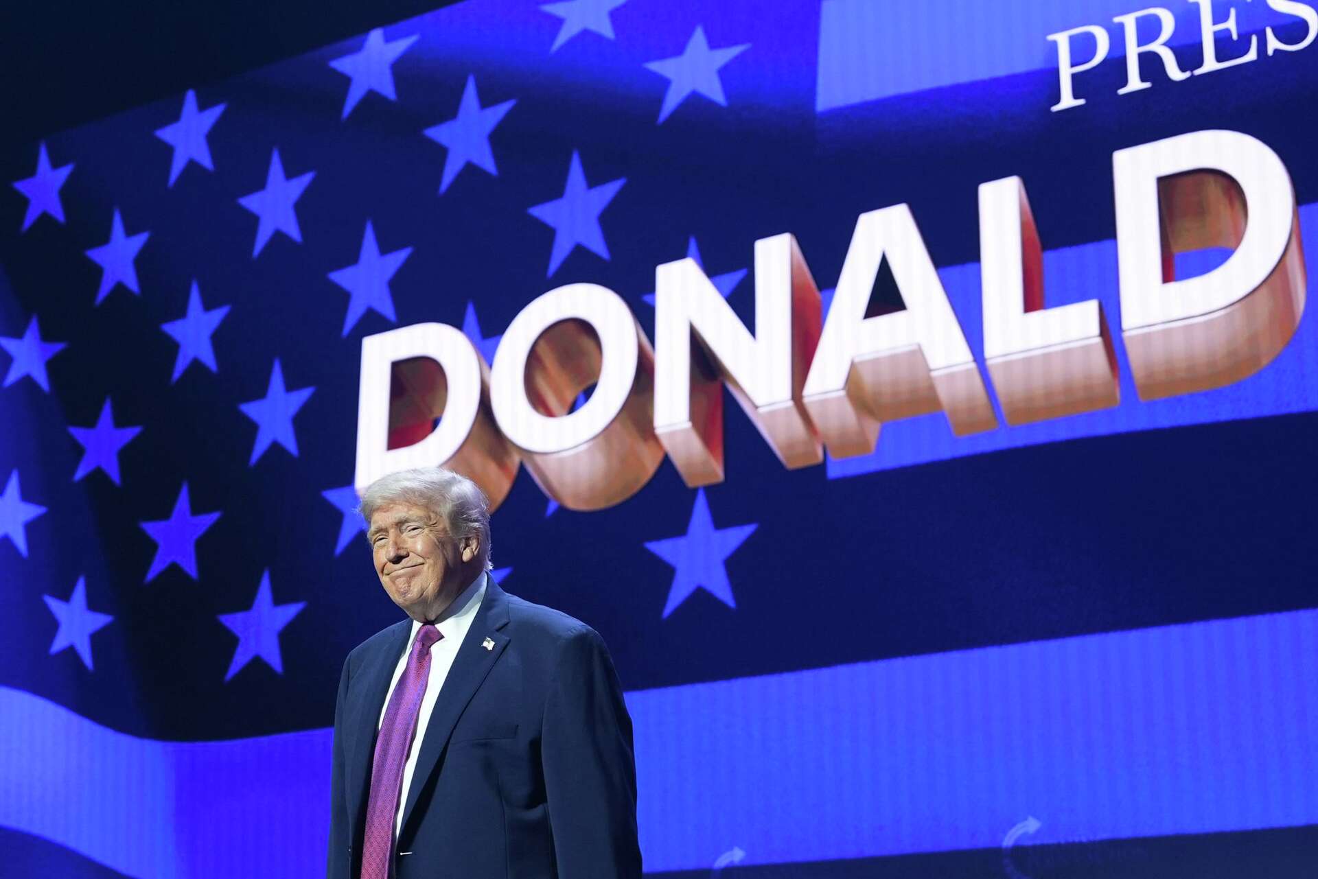 Photos show the 'Build the Red Wall' rally in Arizona, headlined by Trump