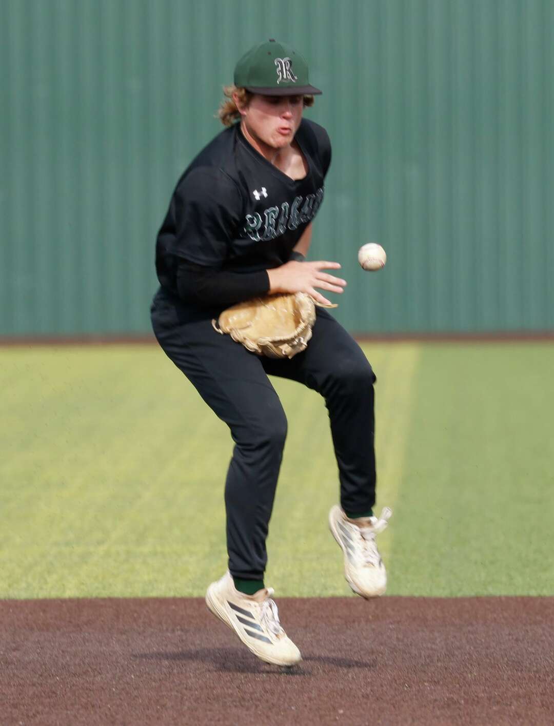 Reagan holds off Clark as District 27-6A playoff race heats up