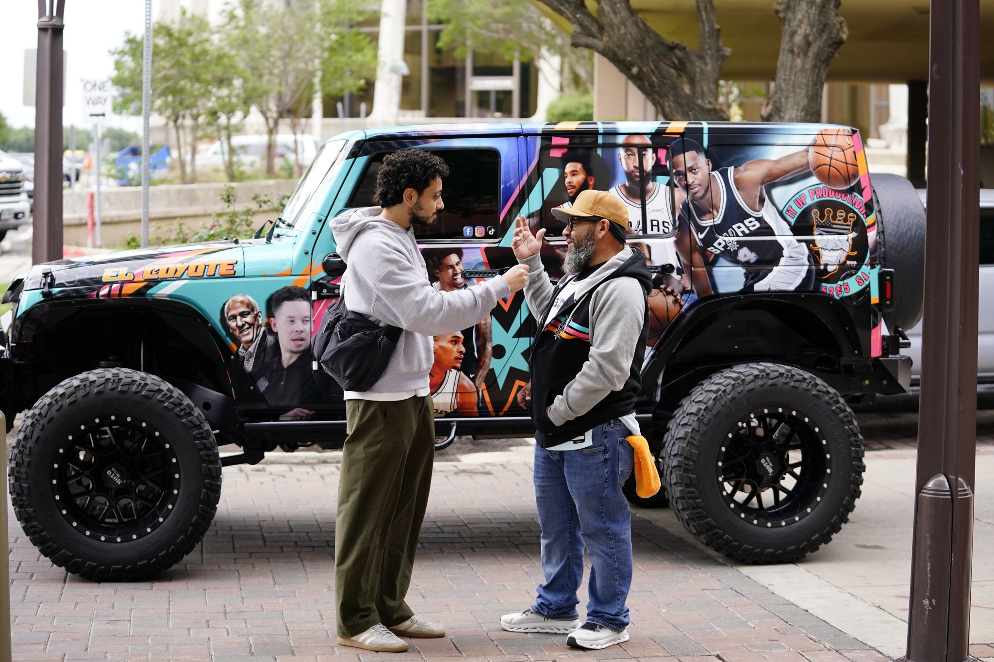 Spurs fans show their love with car wraps, flags and honking