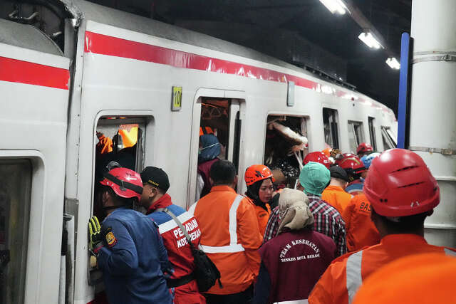 Trains collide near Indonesia's capital, killing at least 4 people