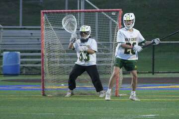 Holy Cross lacrosse goalie is the only girl on the team