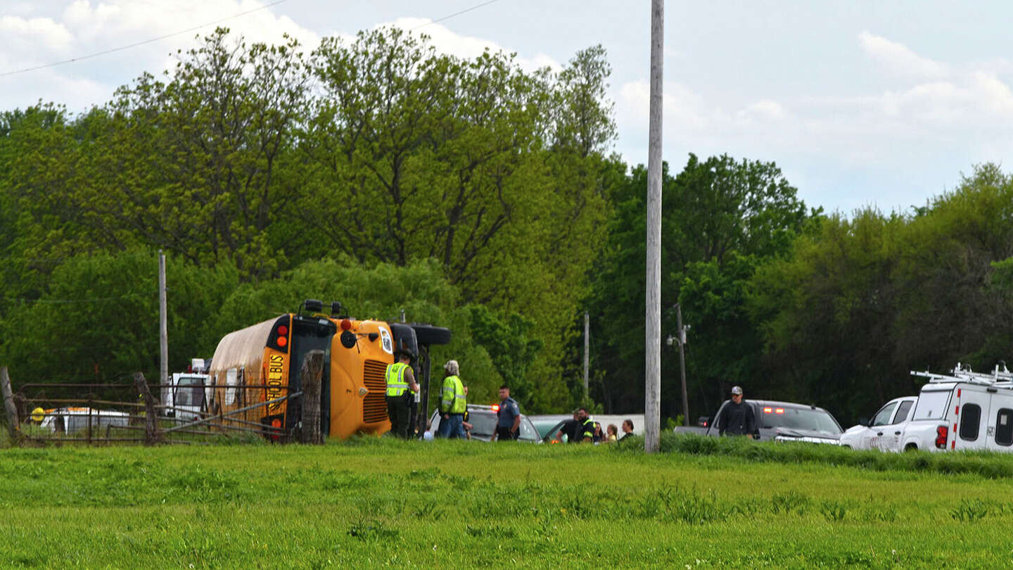 School bus rollover closes highway south of White Hall